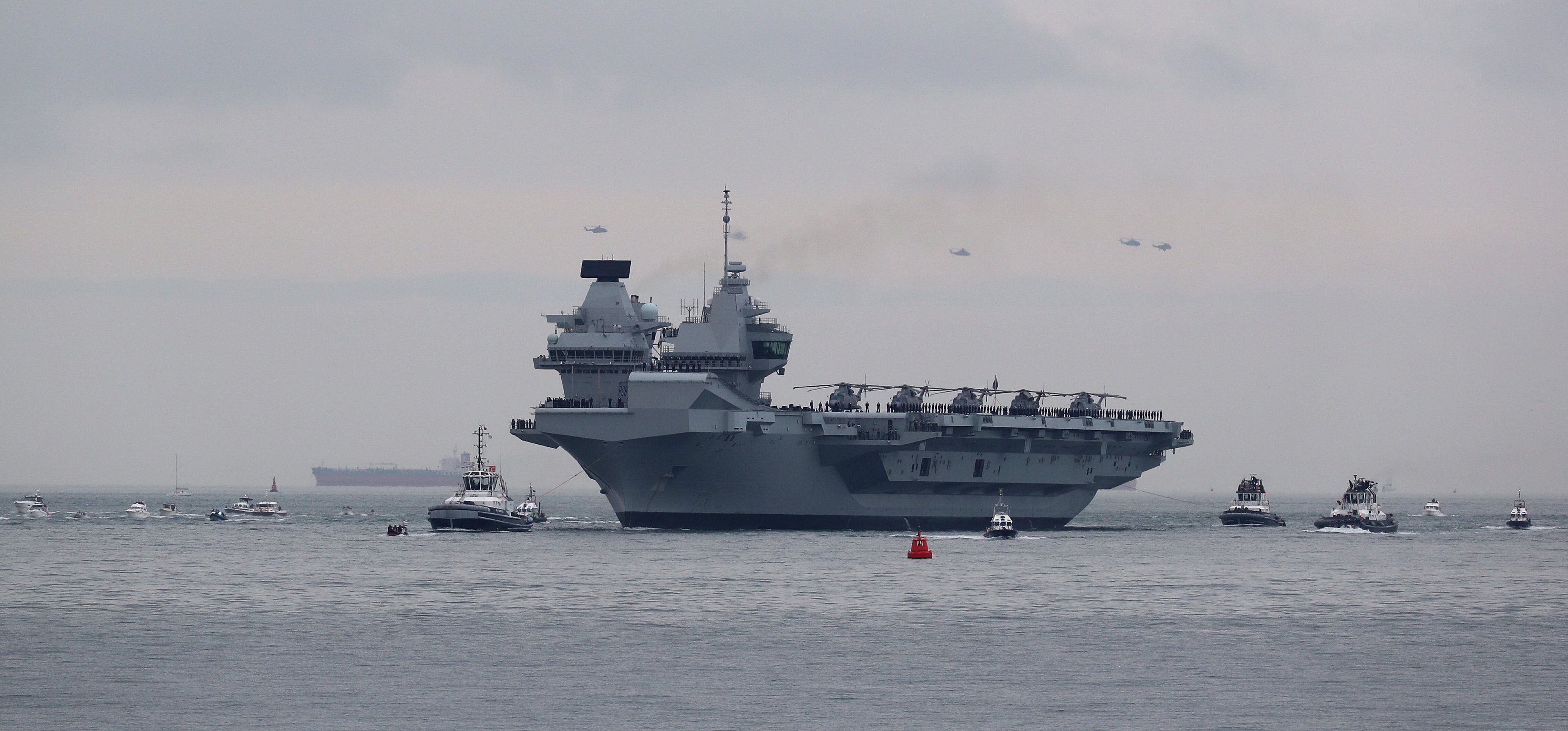 Queen to commission aircraft carrier HMS Queen Elizabeth into the Royal ...